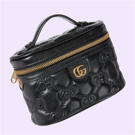 GG Matelassé top handle mini bag in black leather GUCCI US