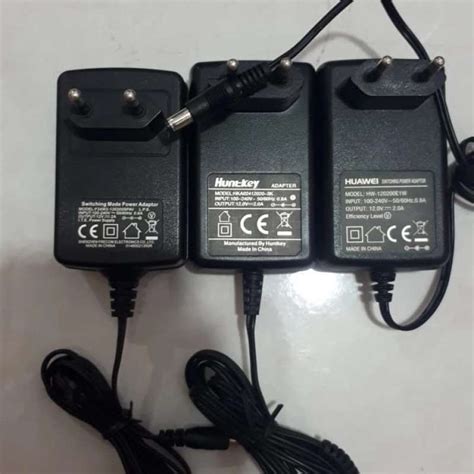 Promo OEM ADAPTOR 12V 2A HUAWEI HUNTKEY SWITCHING MODE POWER ADAPTOR Diskon 50 Di Seller Easy