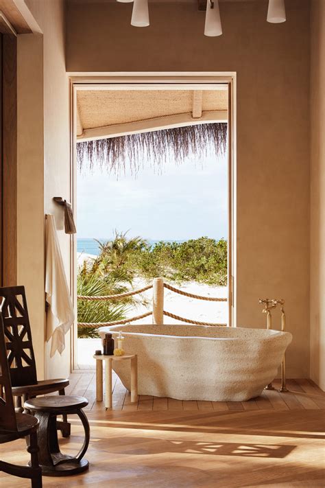 NJF Design Creates Thatched Resort Surrounded By Dunes In Mozambique