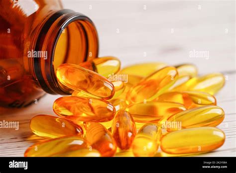 Fish Oil Or Cod Liver Oil Gel In Capsules With Omega 3 Vitamins