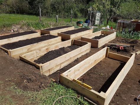 Premium Photo Build Raised Wooden Beds To Make A Vegetable Garden At