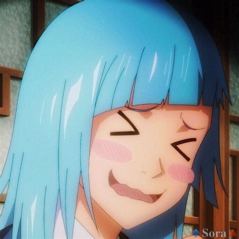 An Anime Character With Blue Hair Is Smiling