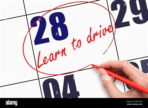 28th day of the month hand writing text learn to drive on calendar