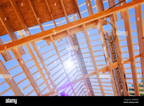 Wooden Roof Beams Are Constructed From Frameworks Of Trusses With