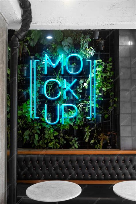 Premium Psd Wall Logo Mock Up Design With Vegetation Background