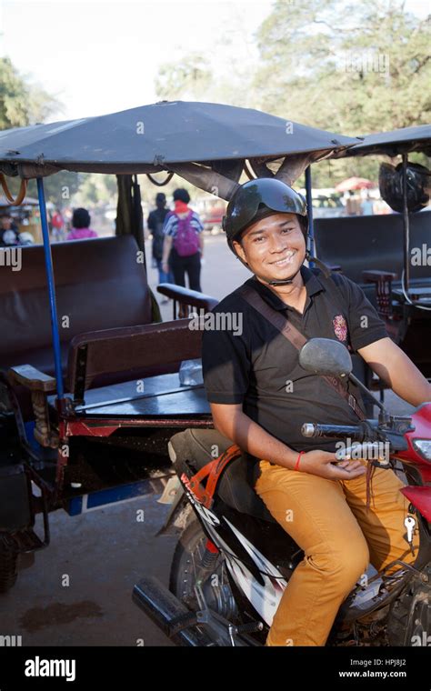 Tuk Tuk Driver Waiting For His Passenger Tourists Visiting Angkor Wat