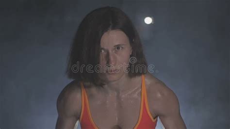 Beautiful Fitness Woman With Lifting Dumbbells Sporty Girl Showing Her Well Trained Body Stock