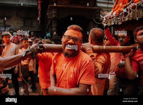 Nepalese Devotees Are Carrying The Chariot During The Celebration Of