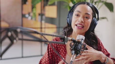 Beautiful Radio Host Recording Podcast In Studio During Interview Stock