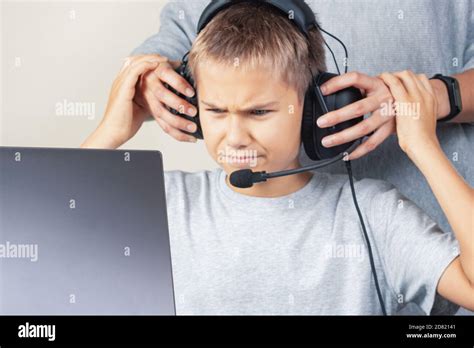 Mother Takes Off Headphones Her Angry Teenage Son Computer Games