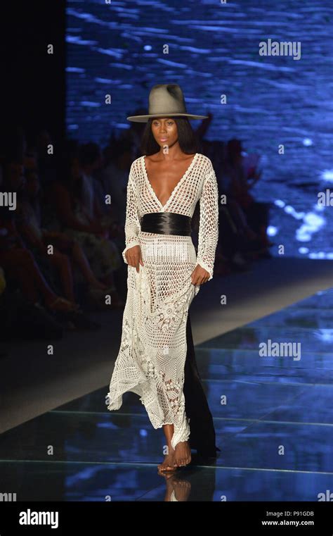 Miami Beach Fl July 12 A Model Walks The Runway For Baes And Bikinis