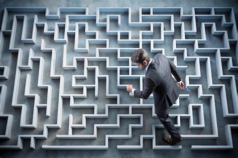 Businessman Navigating Maze Finding The Solution Premium AI Generated Image