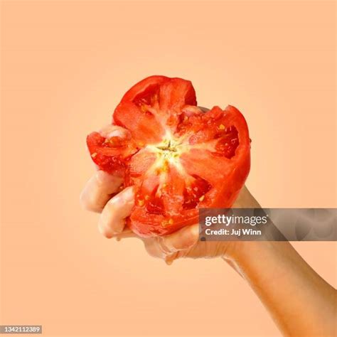 Hand Crushing Fruit Photos And Premium High Res Pictures Getty Images