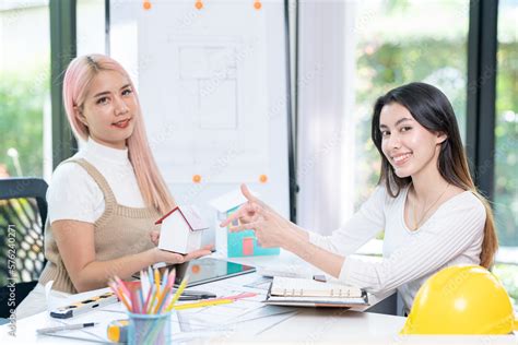 Concept Of Engineering Consulting Two Female Engineers Discussing