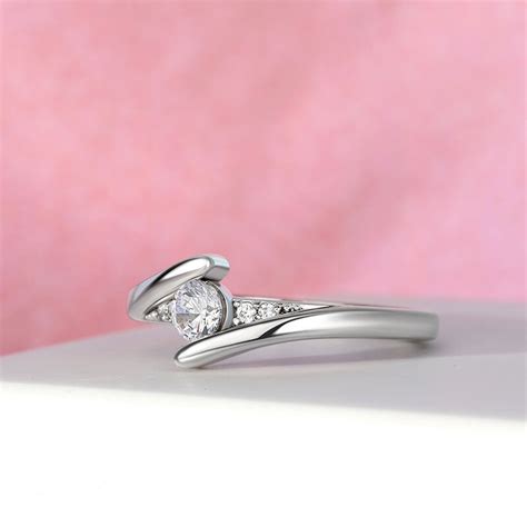 Jeulia Bypass Design Round Cut Sterling Silver Womens Ring Jeulia Jewelry