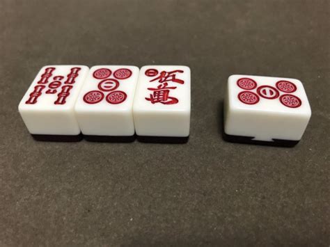 Red Mahjong Tiles With Dice Designs