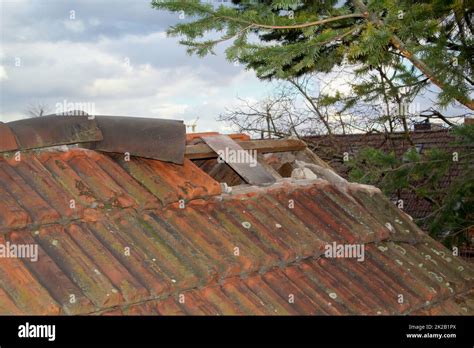 The Damage To The Roof After A Strong Storm Roof Tiles Are Torn Off