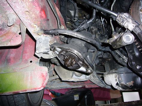 How To Change A Starter Motor AxleAddict