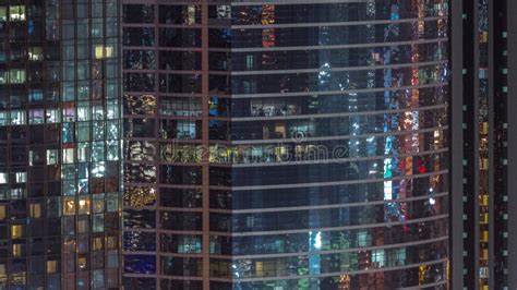 Windows In High Rise Building Exterior In The Late Evening With