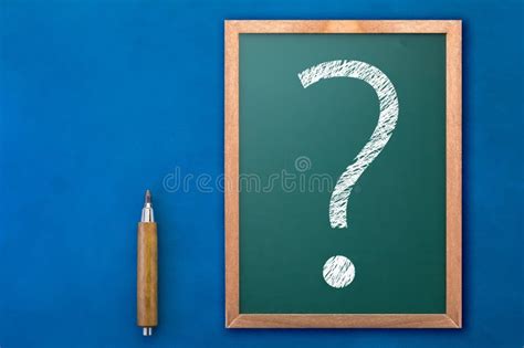 White Drawing Question Mark Icon On Chalkboard Background Stock Photo