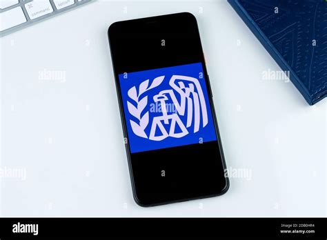 Irs2go Internal Revenue Service App Logo On A Smartphone Screen Stock