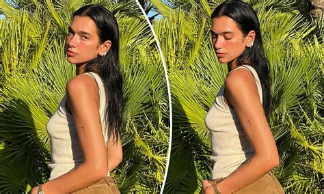 Dua Lipa Puts On Very Cheeky Display In Skimpy Shorts As She Shows Off