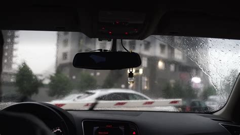 Passenger View Of Car Navigating Traffic On A Rainy Day 10903229 Stock