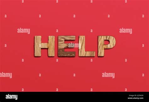 Help Word Written In Wooden Alphabet Letters On Red Background Concept Of Support And