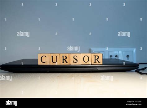 The Word Cursor Is Written Computer And Headset In The Background Stock Photo Alamy