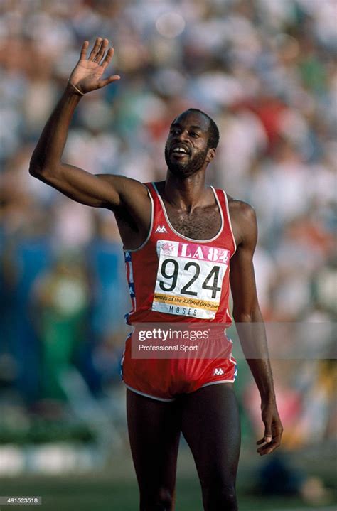 American Hurdler Edwin Moses Of The United States Team Waves To News
