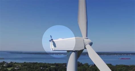 Drone Flies Over Wind Turbine Capturing Unexpected Sunbather