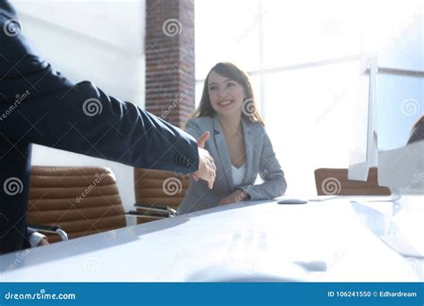 Business Partners Stretching Out Their Hands For A Handshake Stock