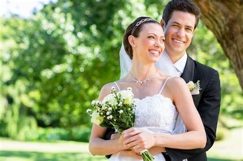 Premium Photo Groom And Bride Standing In Garden