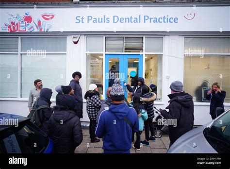 People In Line Outside The St Pauls Dental Practice On Ashley Road