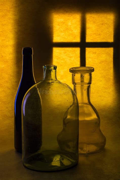 Still Life With Glass Objects On A Window Background Stock Image