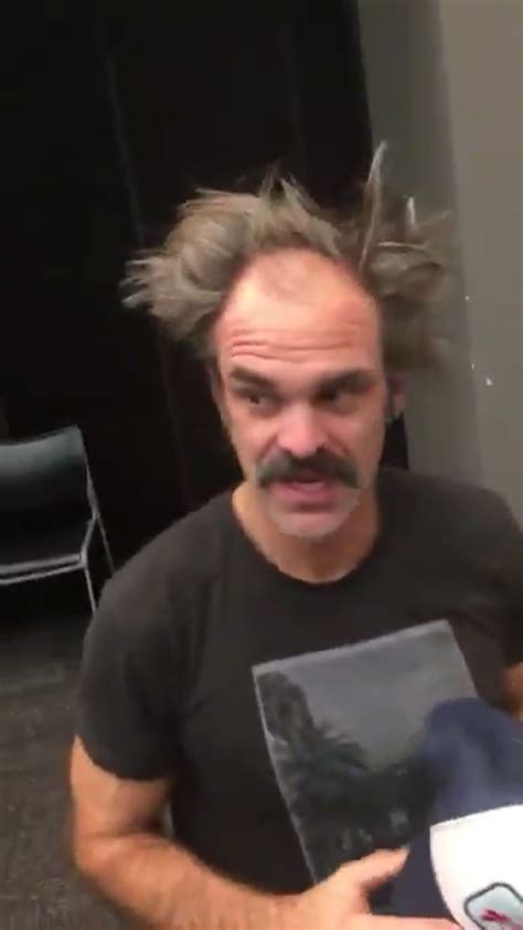 Steven Oggs Hair Springing Out In All Directions As He Took His Hat