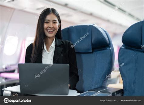 Female Passenger Sitting Plane While Working Laptop Computer Simulated