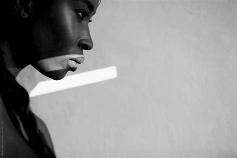 African American Womans Profile With A Light Stripe On The Lips By