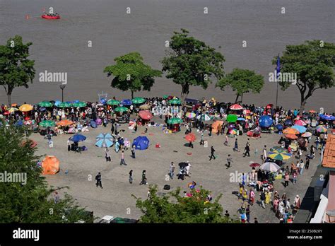 A Crowd Watches Raditional Khmer Boat Racing During The Bon Om Touk Annual Water Festival In