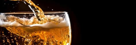 Premium Ai Image Beer Is Elegantly Poured Into A Large Glass Against