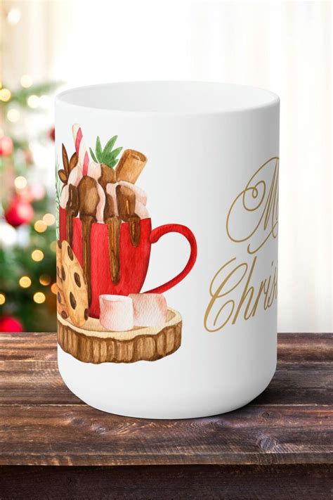 A White Coffee Mug Filled With Hot Chocolate And Marshmallows On Top Of