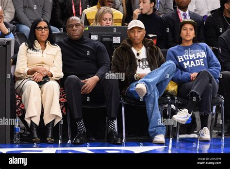 Magic Johnson And His Wife Cookie Johnson Pharrell Williams And His