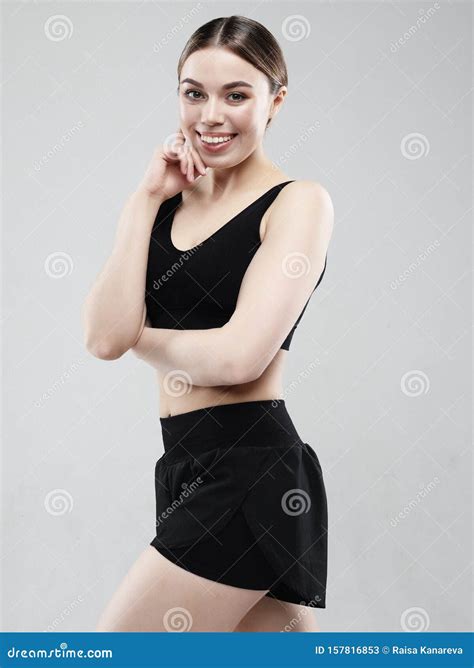 Lovely Young Woman In Sportswear Posing On A White Background Sport Concept Stock Image Image