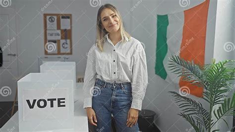 A Young Attractive Blonde Woman Stands In An Irish Electoral College