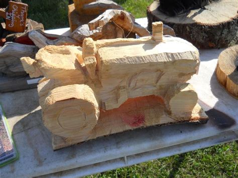 Unfinished Chainsaw Carving Of A Tractor For The Tractor Show Today