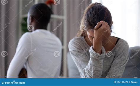 Upset African American Couple Ignoring Each Other After Quarrel Stock