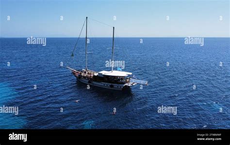 Sailing Boat And Catamaran In Greece Crystal Water Beautiful Colors