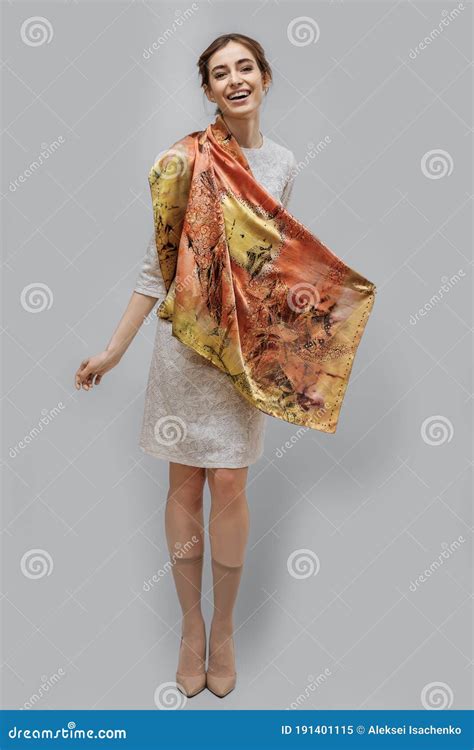 Girl In Old Fashioned Dress With Colorful Silk Scarf Stock Image