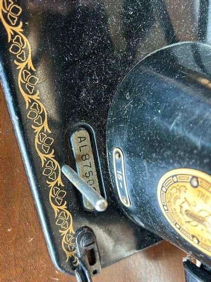 Singer Sewing Machine In Case Integrity Auctioneers