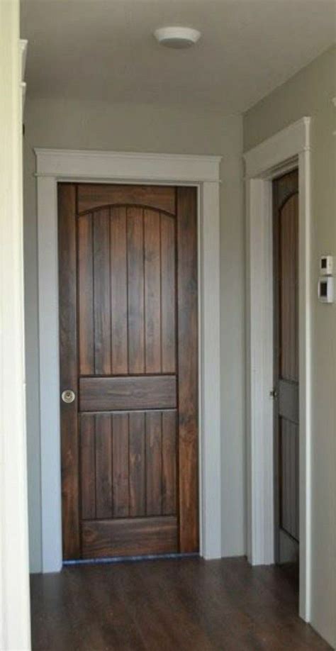 Dark Stained Wooden Doors With Satin Nickle Door Knobs Wood Doors Interior Interior Barn